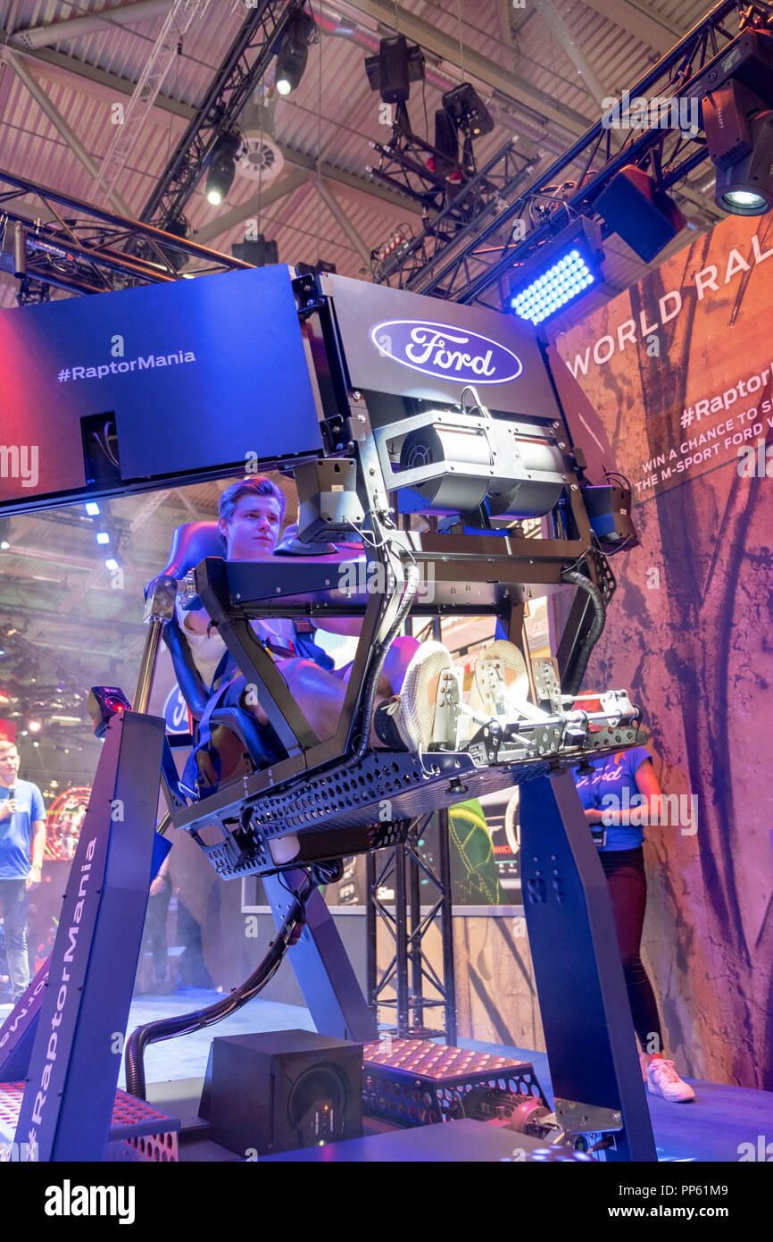 Visitor in the 4D driving simulator of Ford #RaptorMania at the world's ...