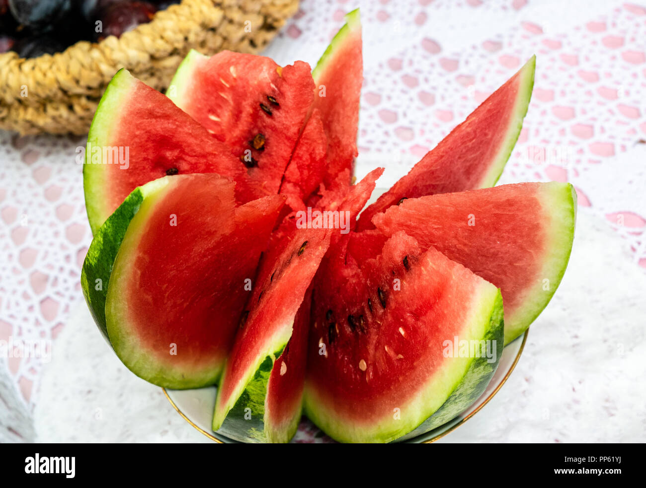 Cut watermelon on the table. Ripe watermelon Stock Photo - Alamy