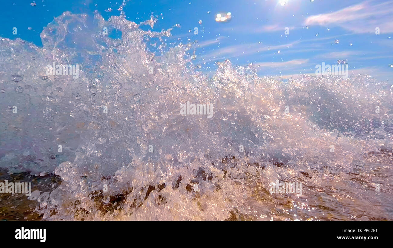 The wave runs on the beach in summer on a Sunny day Stock Photo - Alamy
