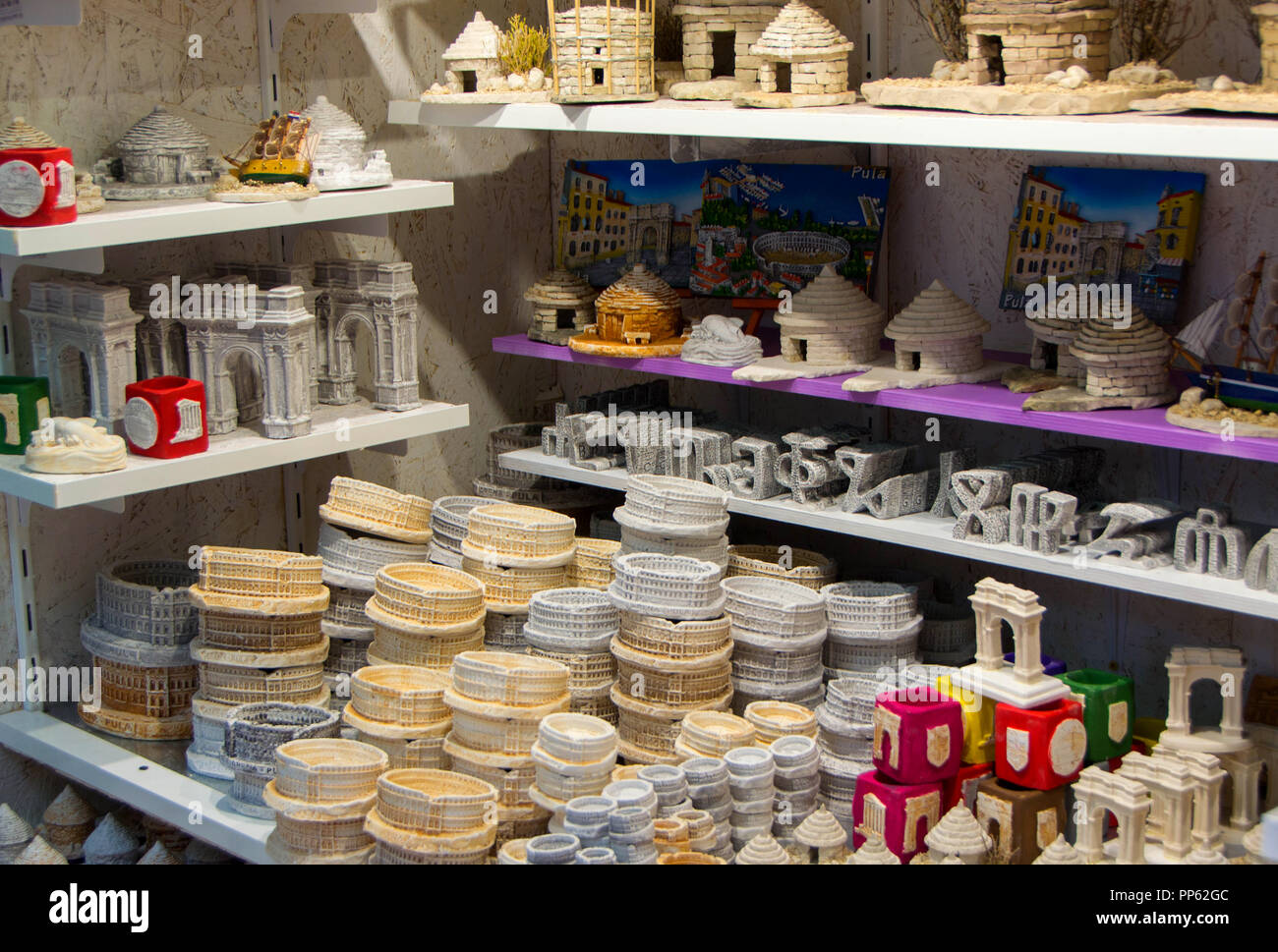 Sale of souvenirs on street stalls. Models of the sights of the city of ...