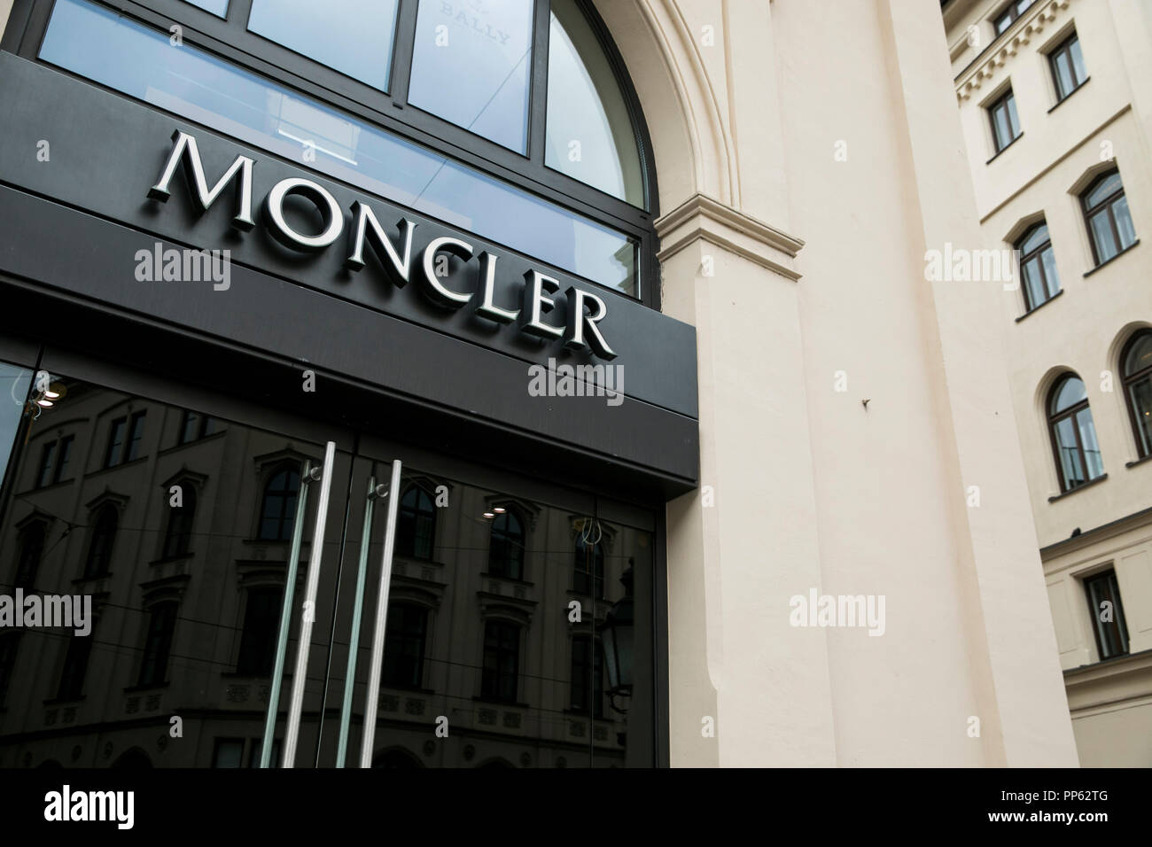 A logo sign outside of a Moncler retail store in Munich, Germany, on ...