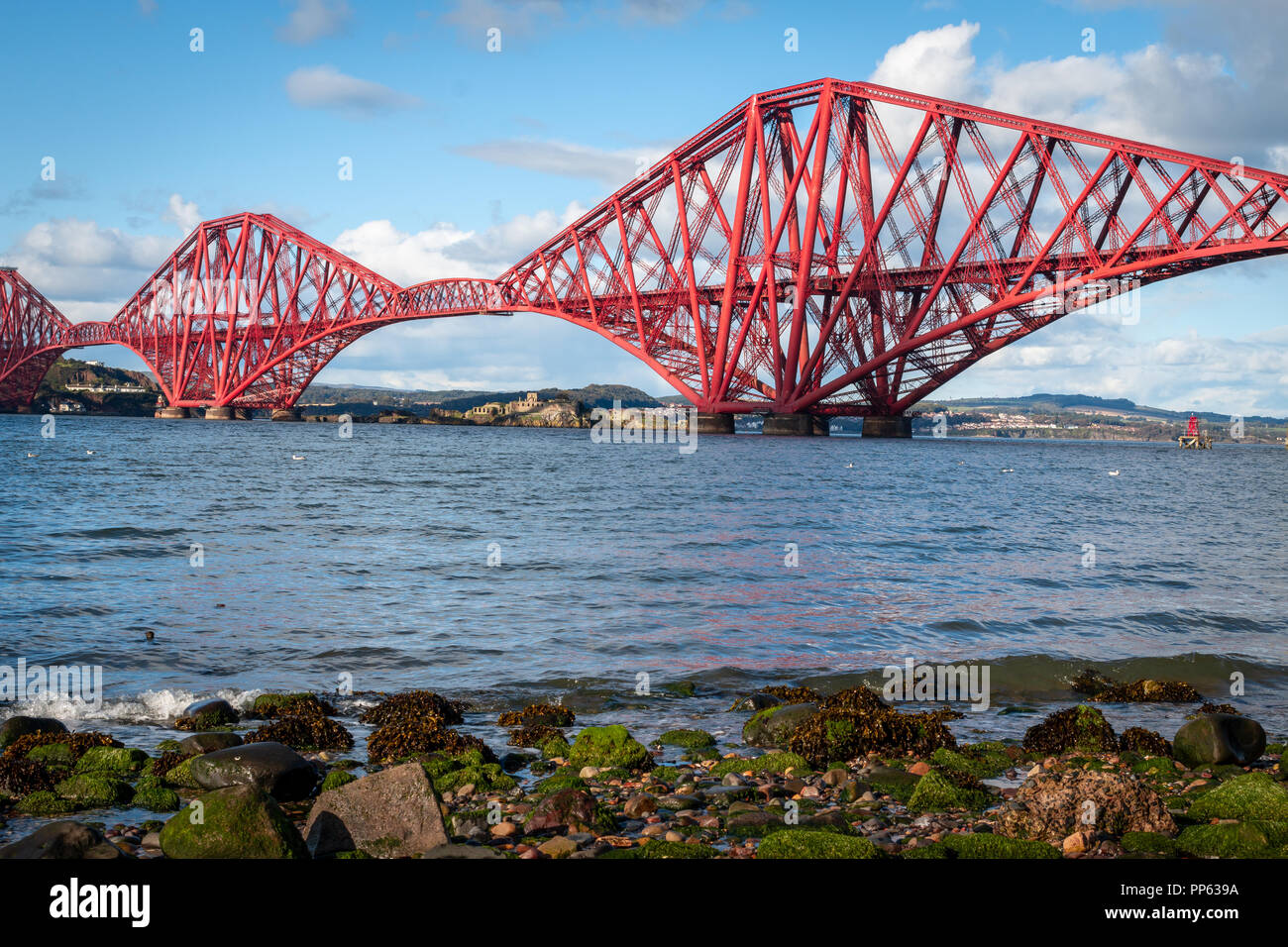 Train Bridge seen from a small beach at Queensferry Stock Photo - Alamy