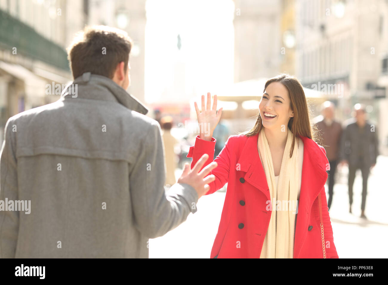 Greet friends street hi-res stock photography and images - Alamy