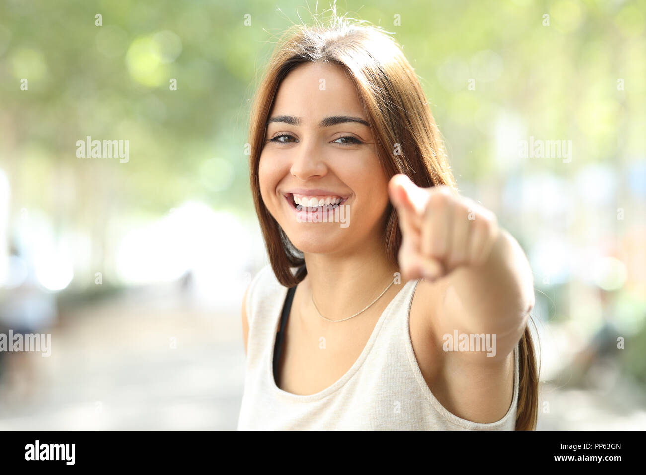 Woman points teeth hi-res stock photography and images - Alamy
