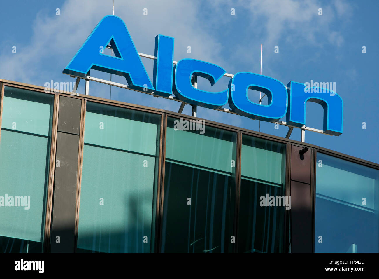 A logo sign outside of a facility occupied by Alcon in Vienna, Austria ...