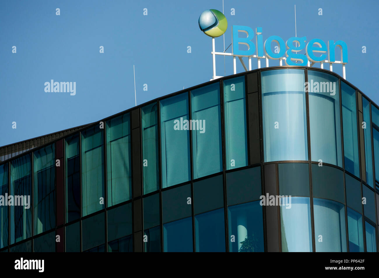 A logo sign outside of a facility occupied by Biogen in Vienna, Austria ...