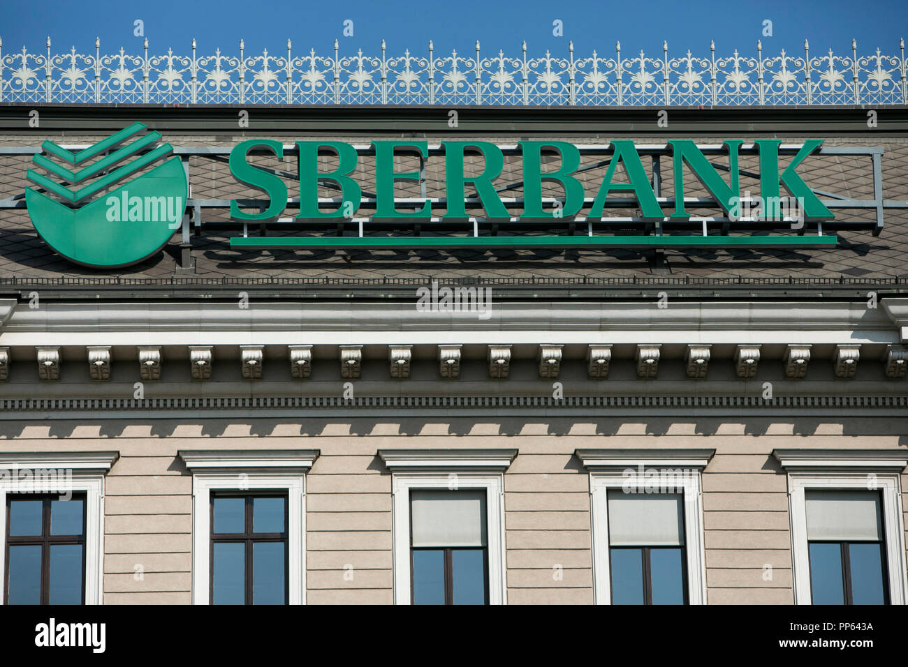A logo sign outside of a facility occupied by Sberbank in Vienna ...