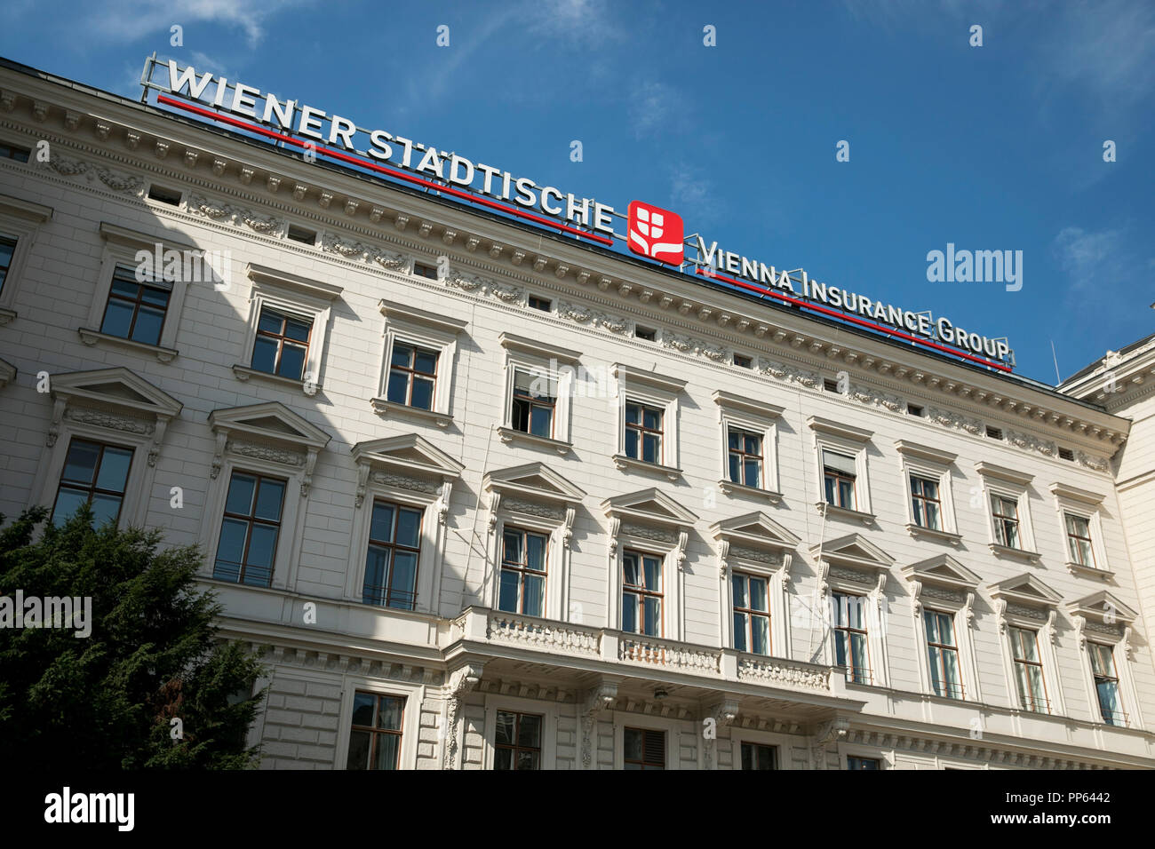 A logo sign outside of a facility occupied by Vienna Insurance Group AG ...