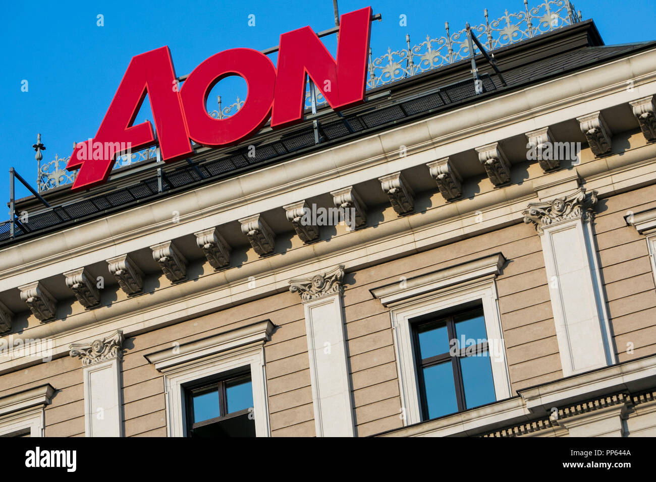 A logo sign outside of a facility occupied by Aon plc in Vienna ...