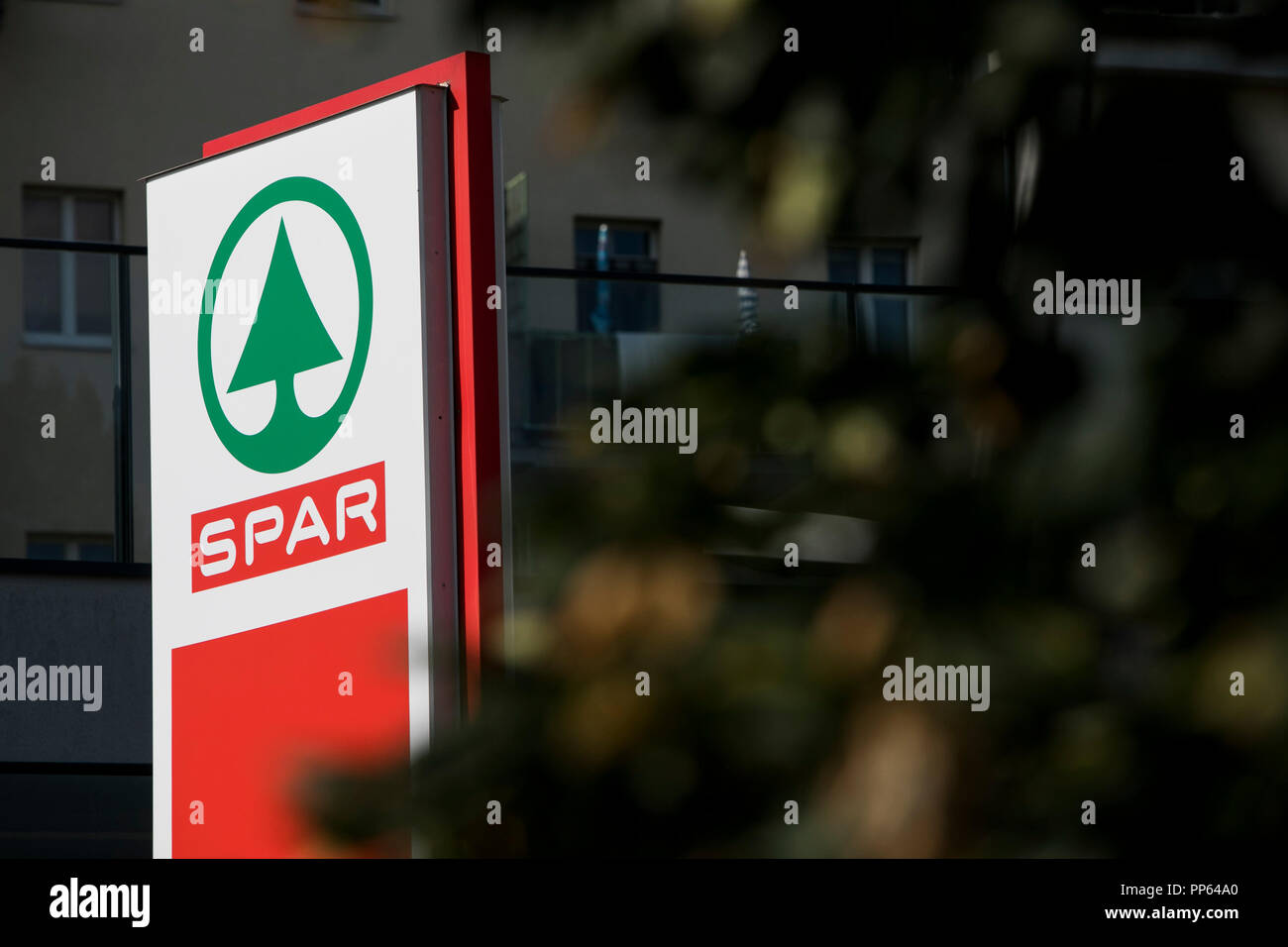 A logo sign outside of a SPAR retail grocery store in Vienna, Austria ...