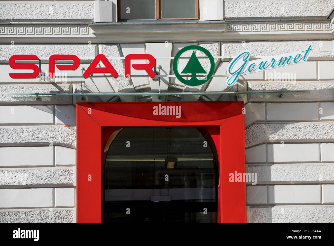 A logo sign outside of a SPAR retail grocery store in Vienna, Austria ...