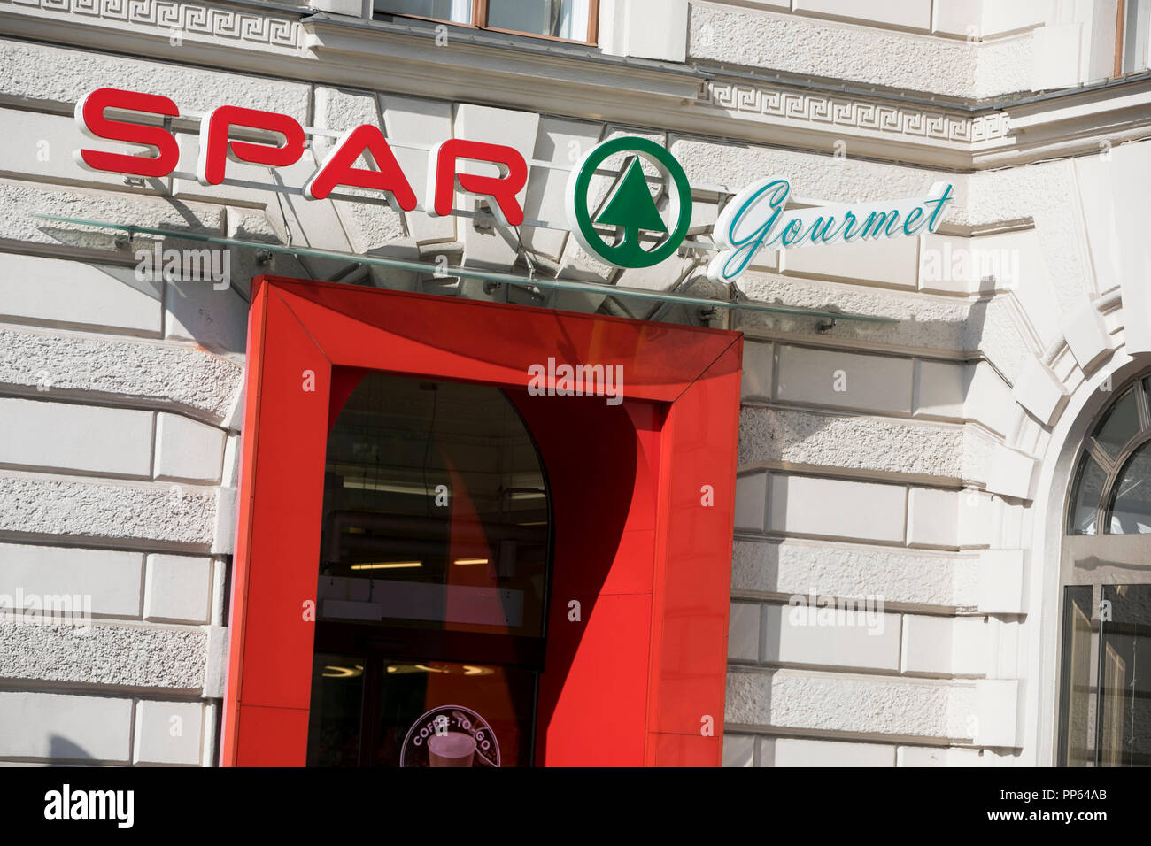 A logo sign outside of a SPAR retail grocery store in Vienna, Austria ...
