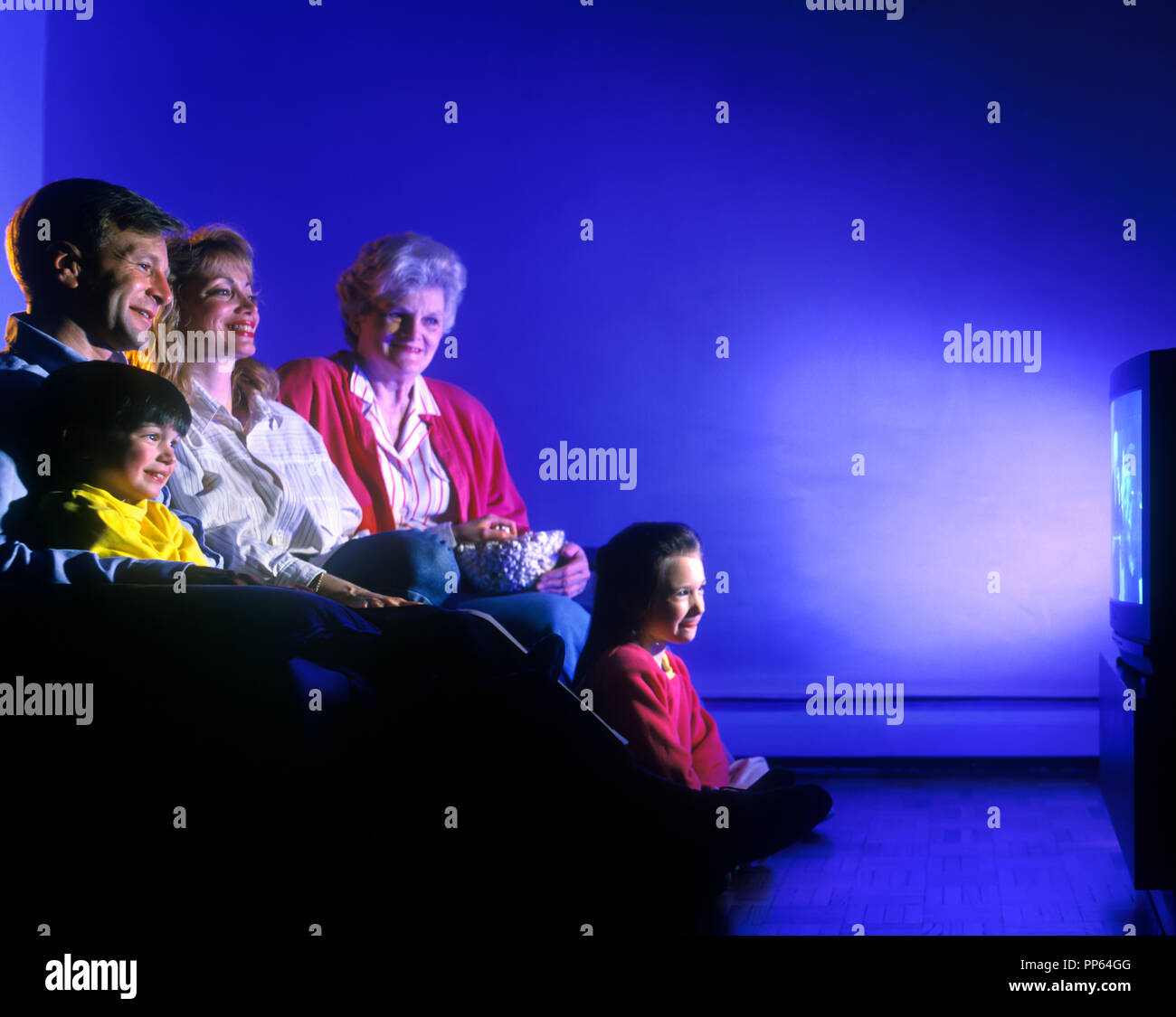 1994 HISTORICAL CAUCASIAN THREE GENERATION FAMILY SITTING ON COUCH ...