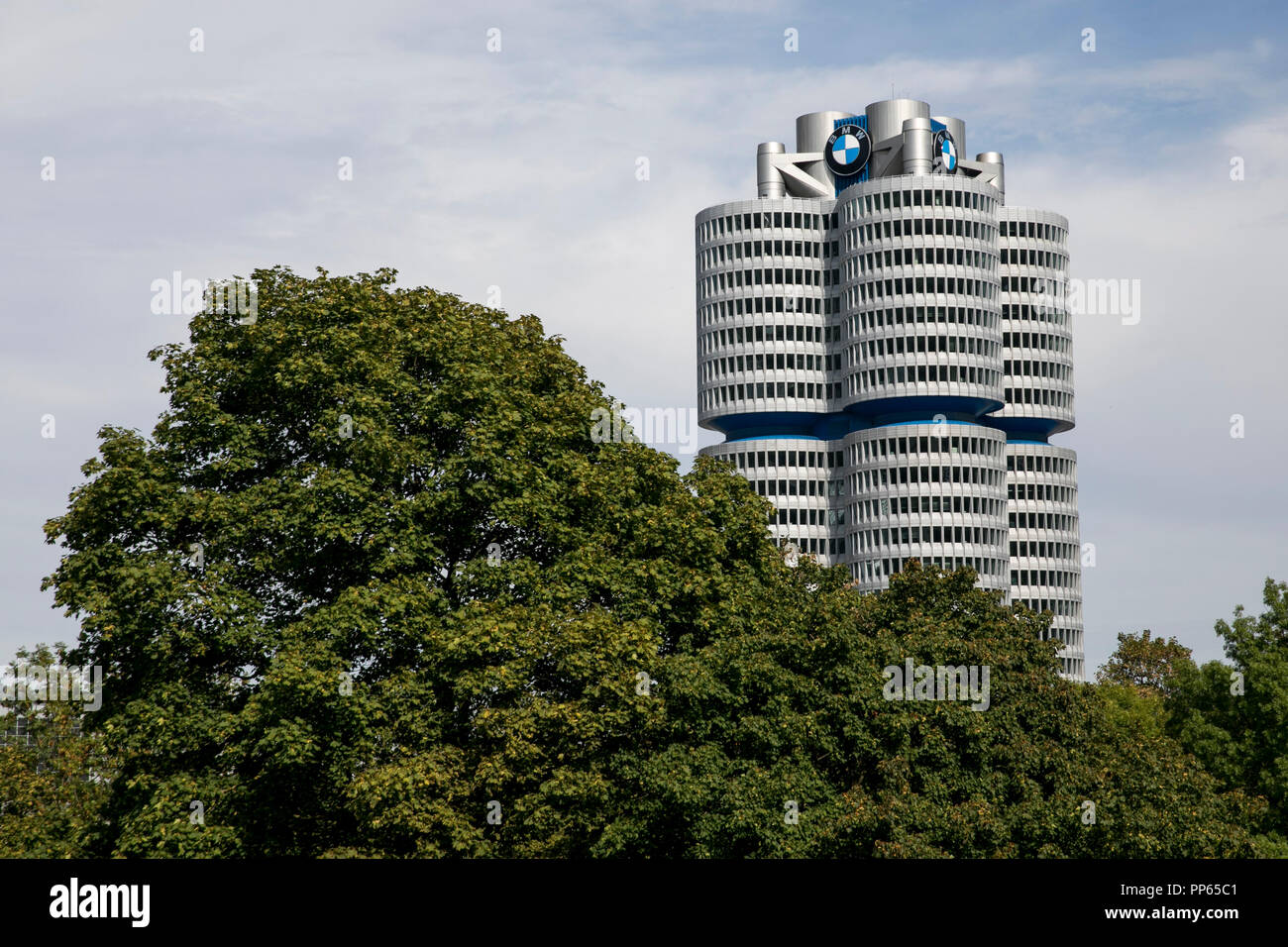A logo sign outside of the headquarters of the BMW Group (Bayerische ...