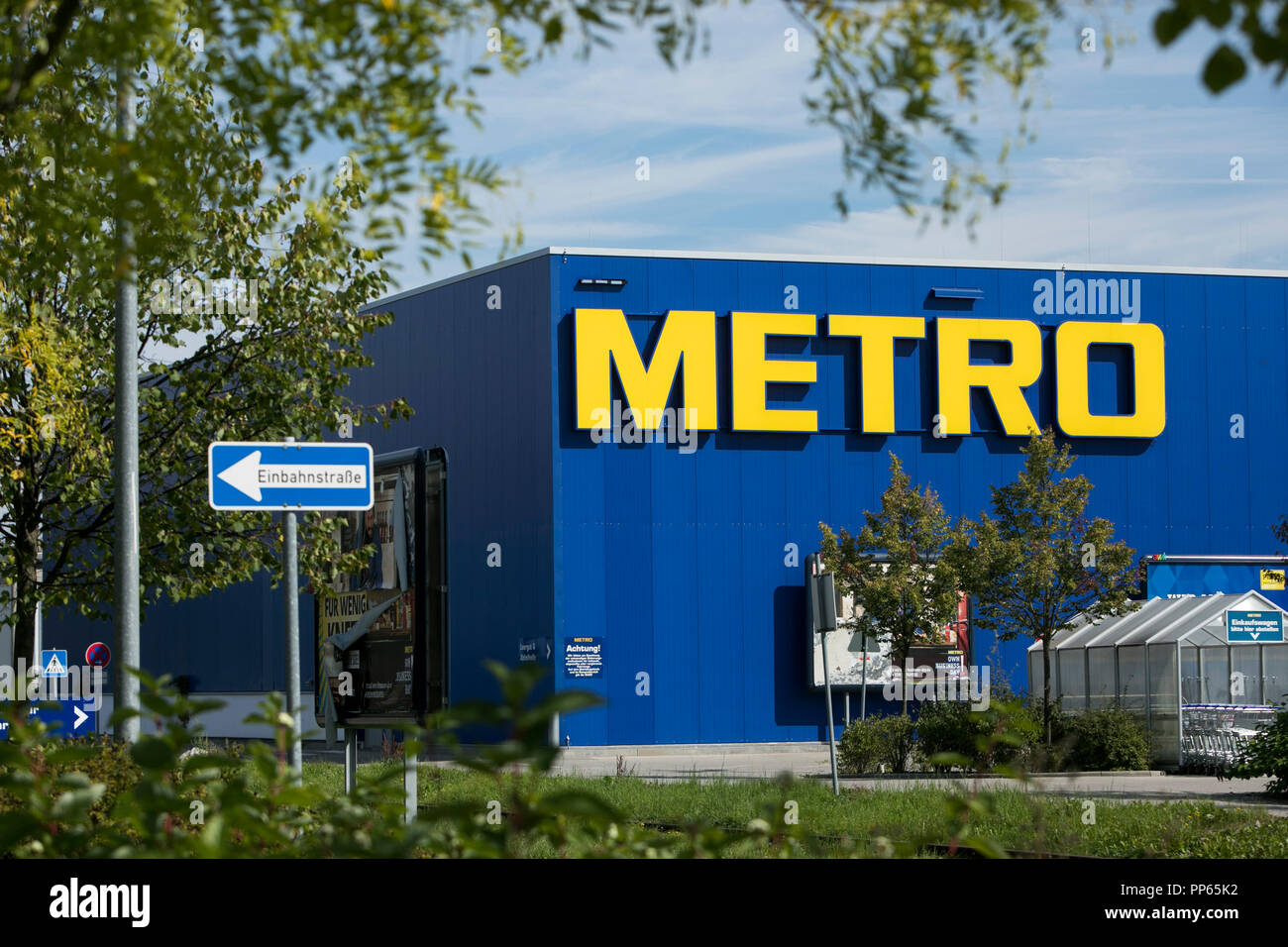 A logo sign outside of a Metro Group retail store in Munich, Germany ...
