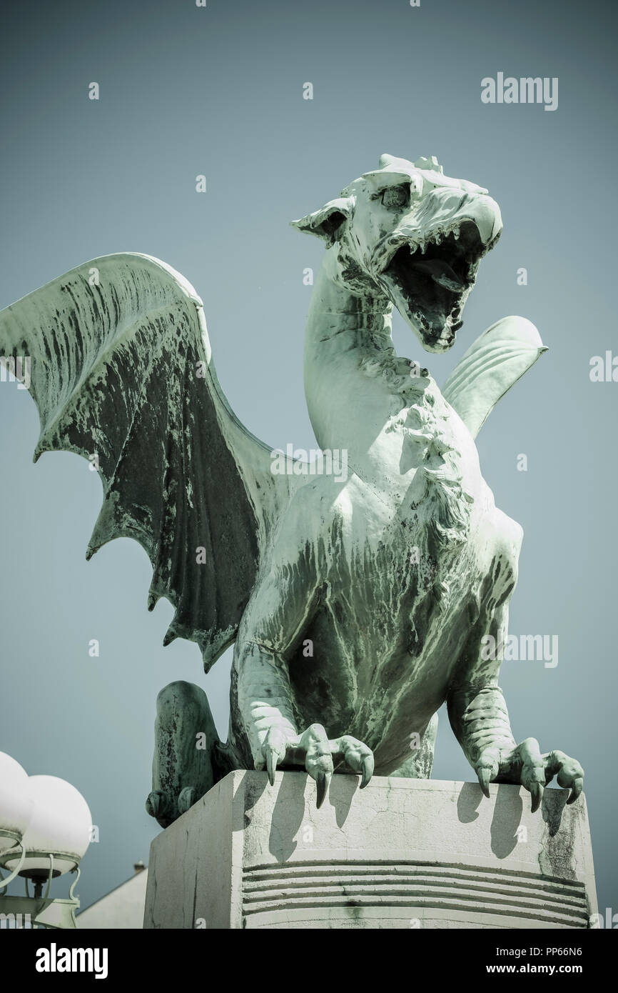 Dragon statue on the Dragon Bridge Stock Photo - Alamy