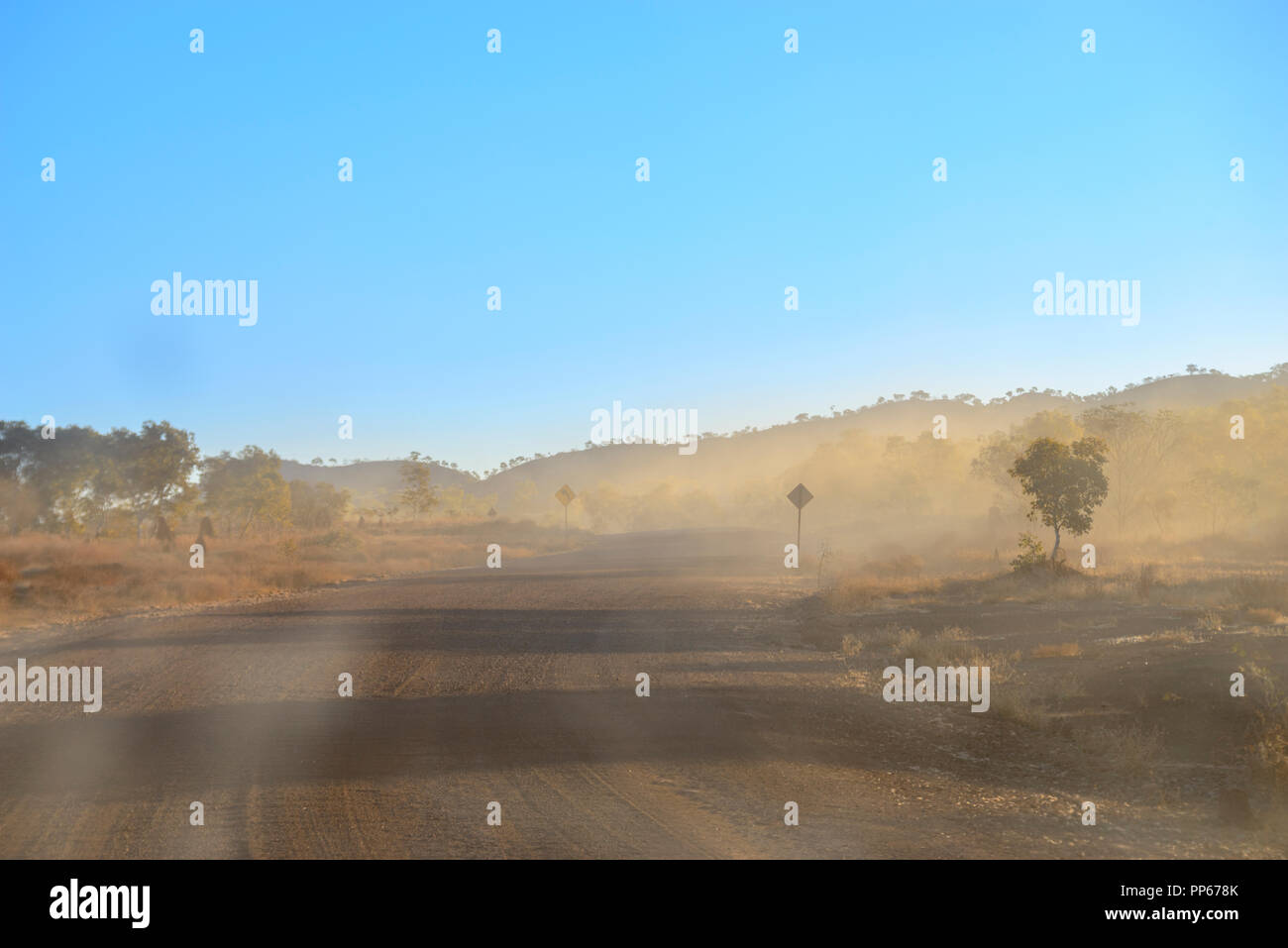 Dusty red dirt road through hi-res stock photography and images - Alamy
