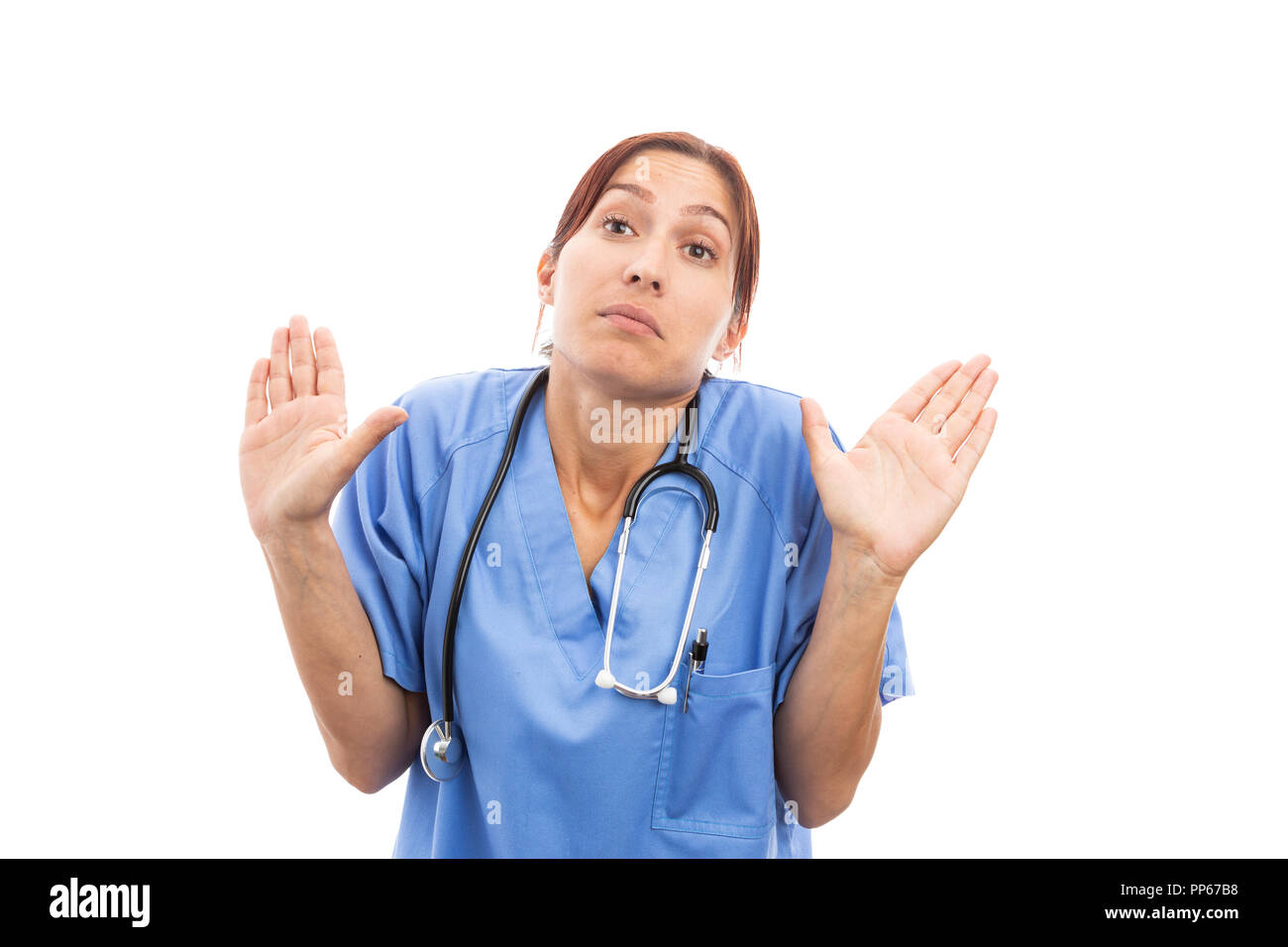 Clueless female medical nurse or doctor making dont know gesture and ...