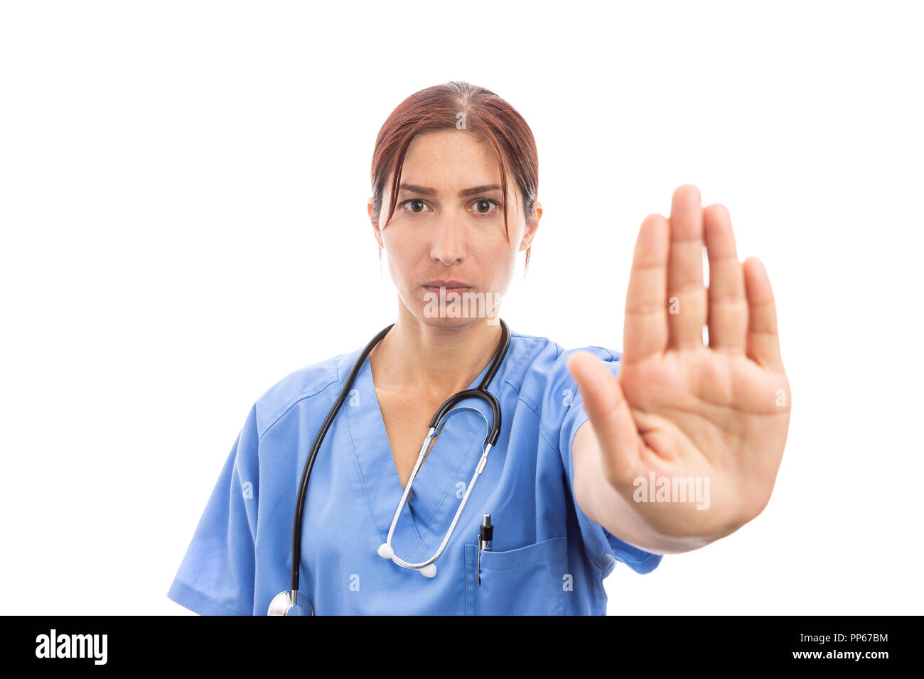 Unhappy woman female nurse making stop refusal gesture with palm up as ...