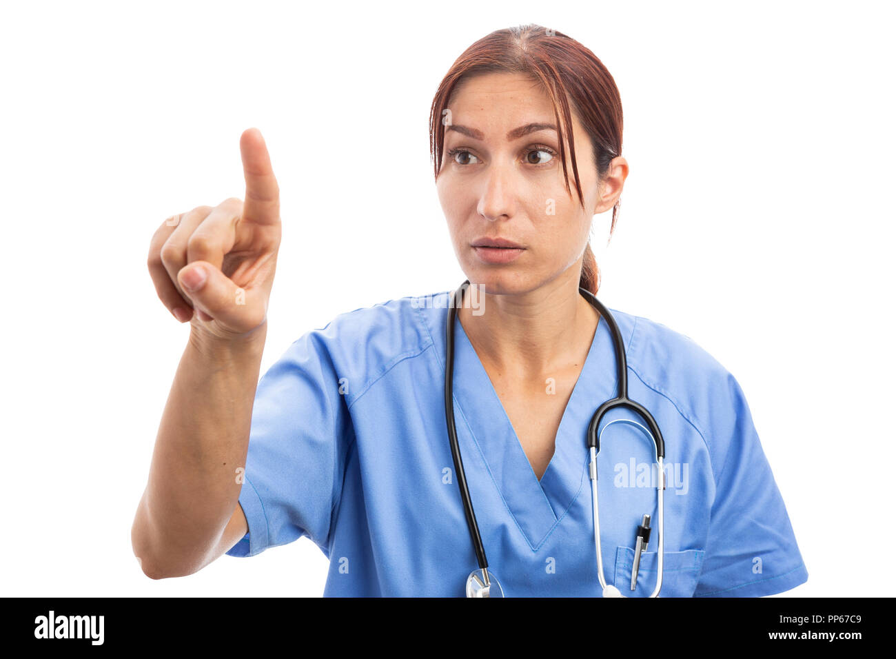 Curious woman nurse or medic touching invisible digital screen with ...