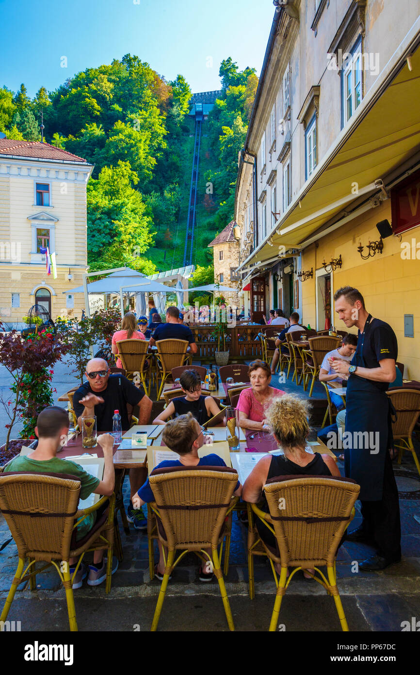 Street and pavement cafe Stock Photo - Alamy