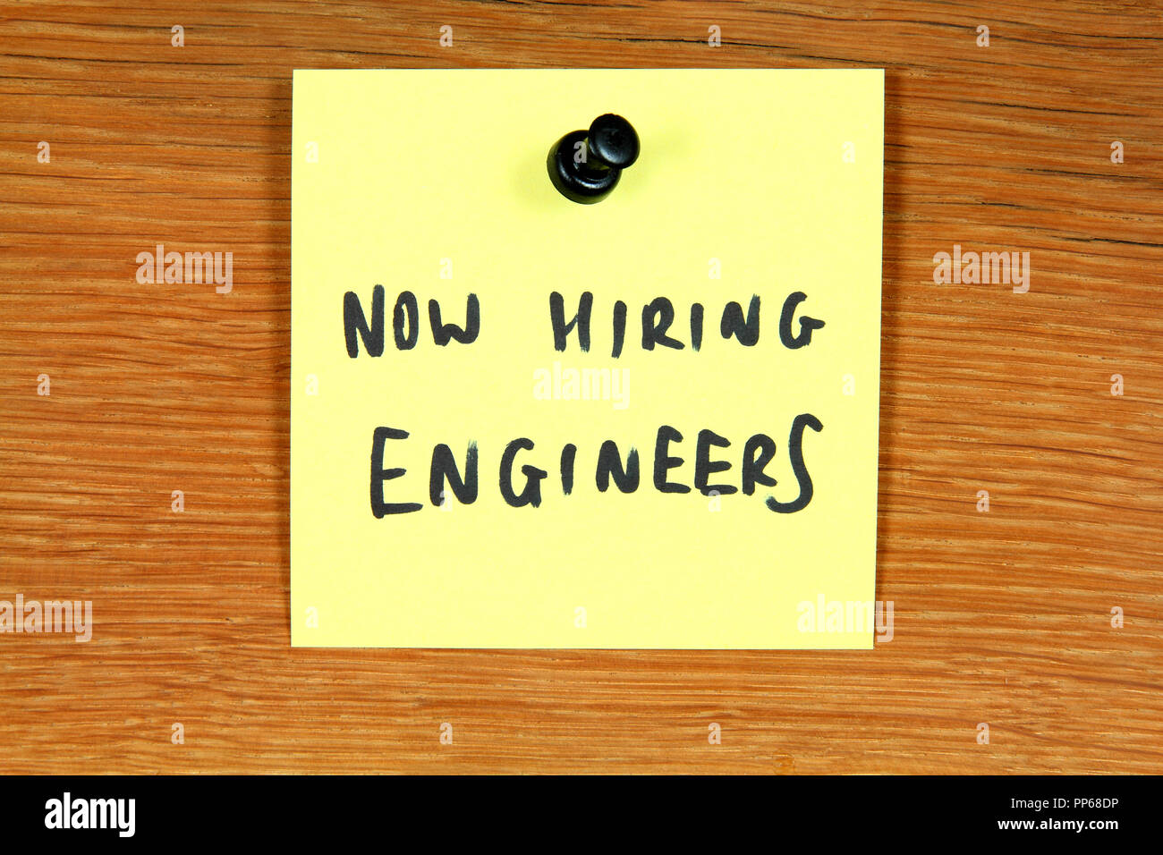 Sticky note with employment opportunity message - hiring engineers ...