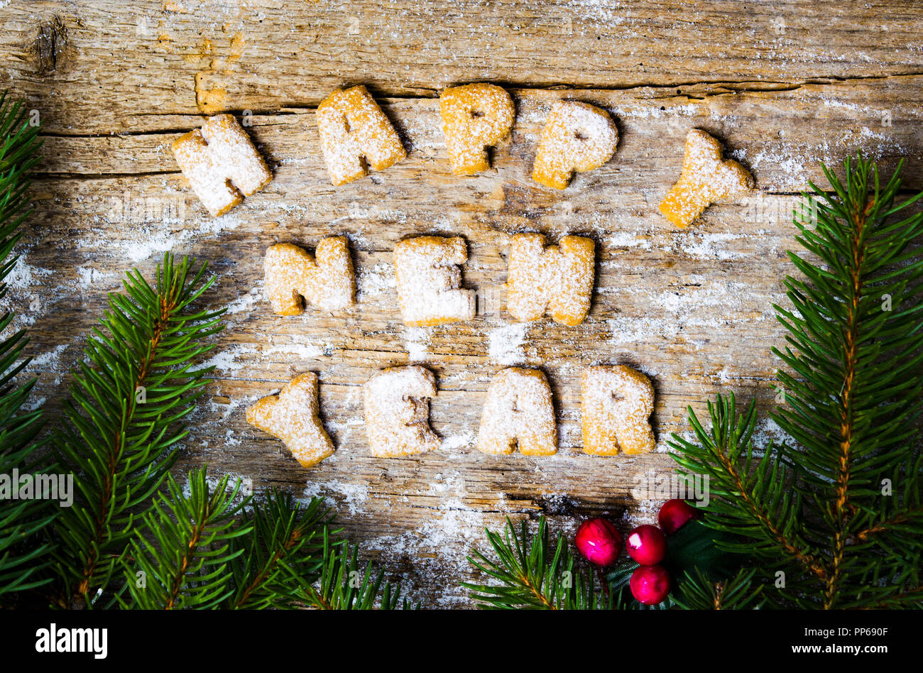 Happy new year note written with cookie letters Stock Photo - Alamy