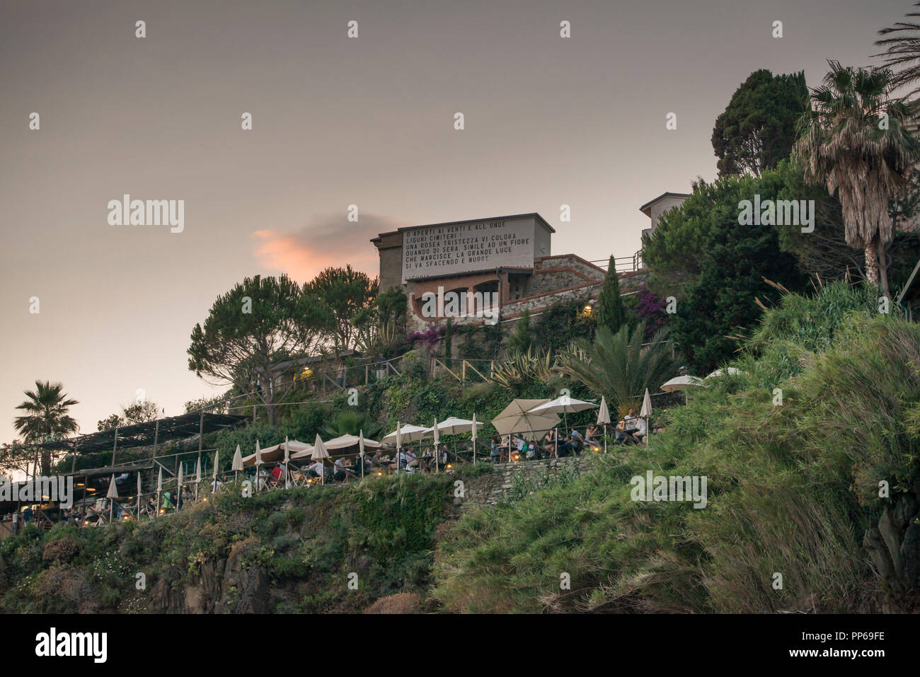 Diners on terrace of restaurant, Manarola, Liguria, Italy Stock Photo ...