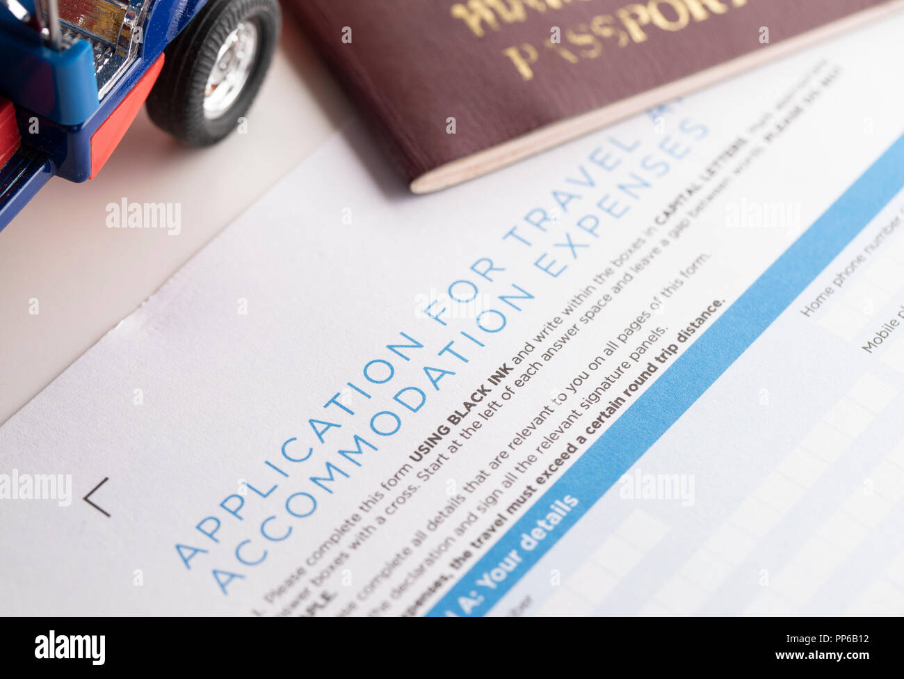 travel application form and passport on the table Stock Photo - Alamy