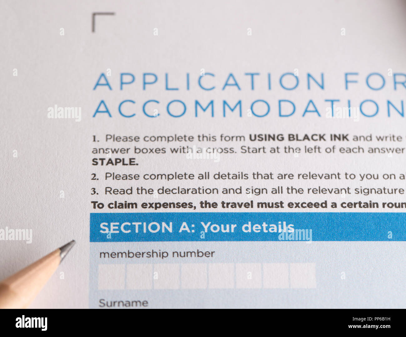 application form paper with pencil wait full fill data Stock Photo - Alamy