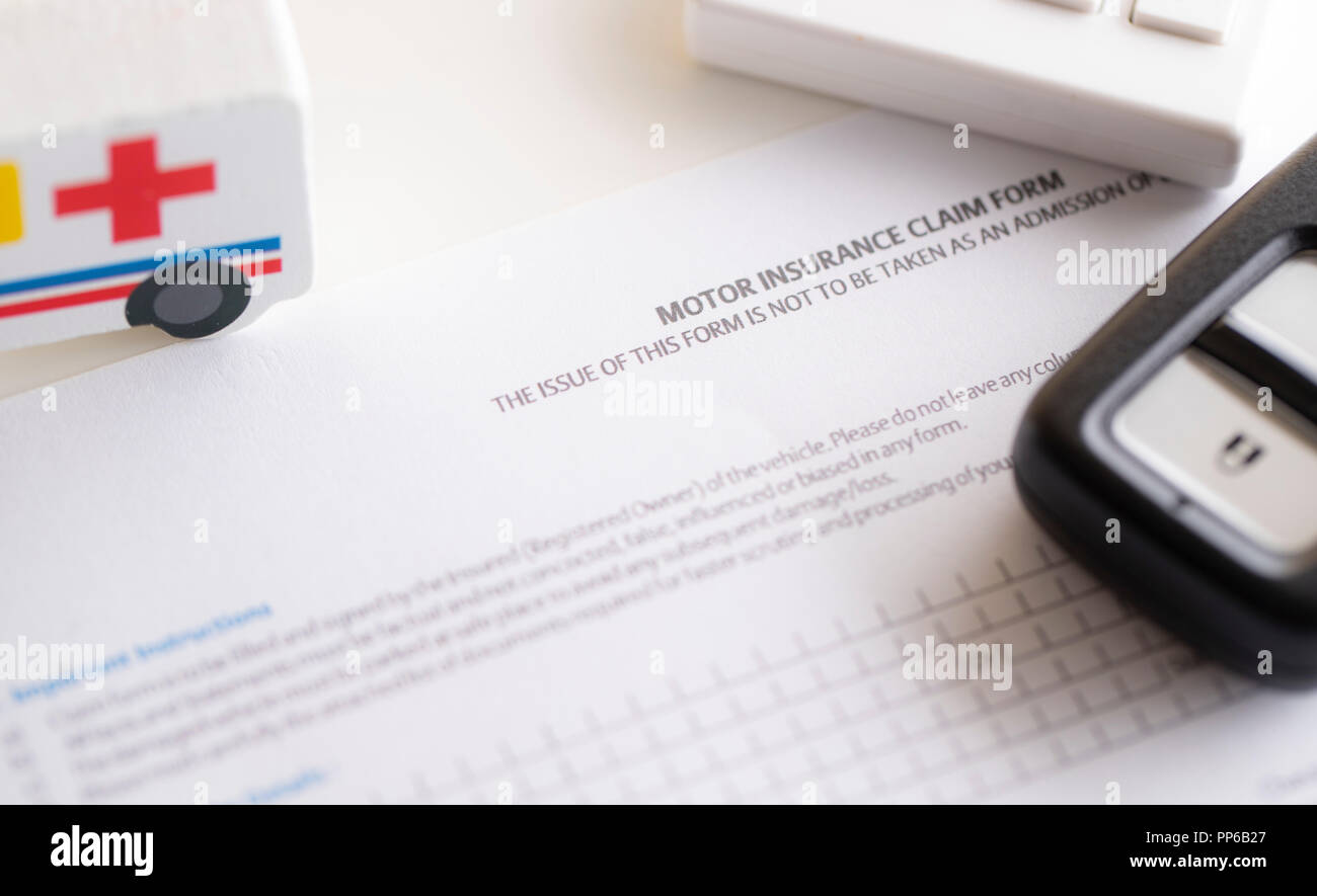 motor insurance claim form with calculator and car remote for fill data ...
