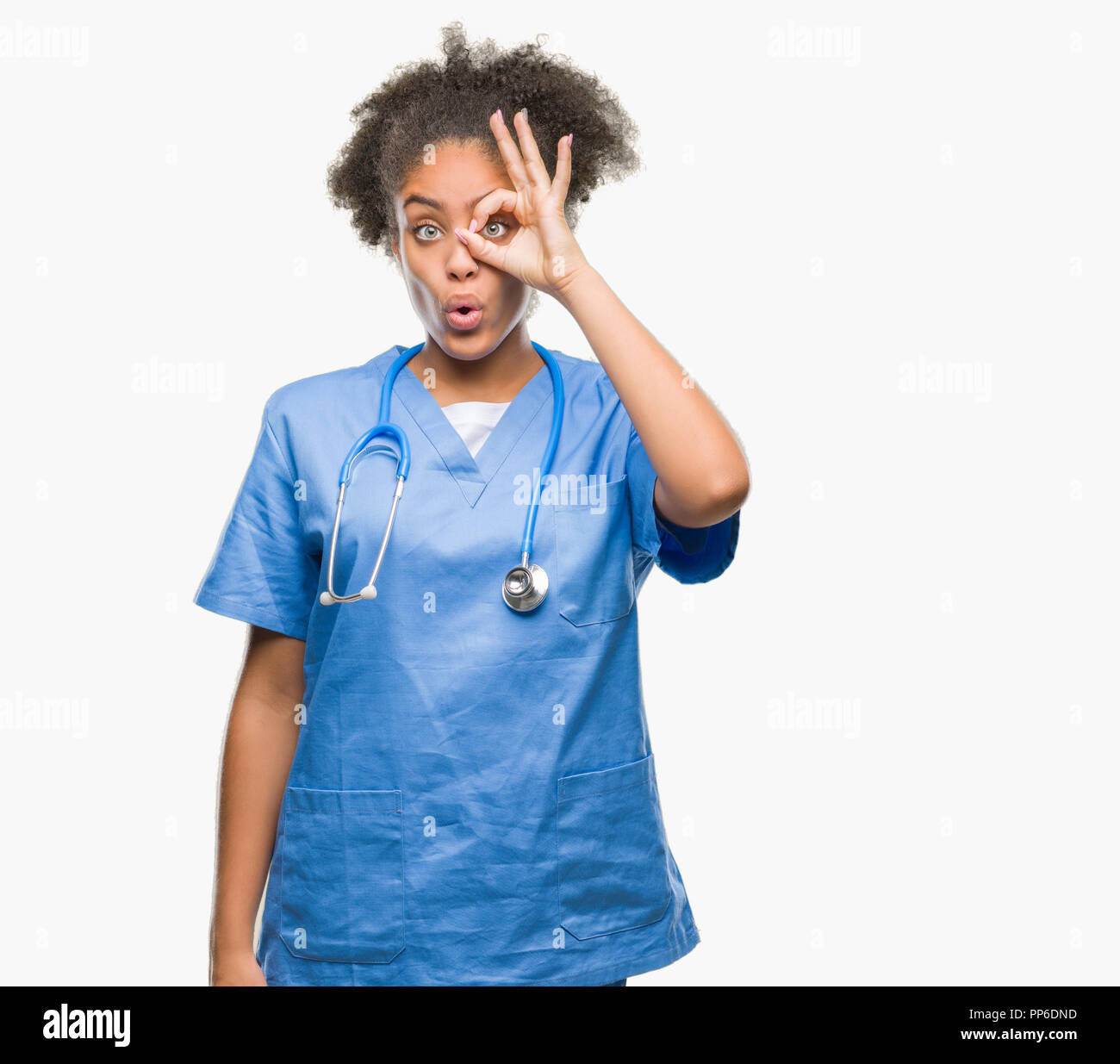 Young afro american doctor woman over isolated background doing ok ...