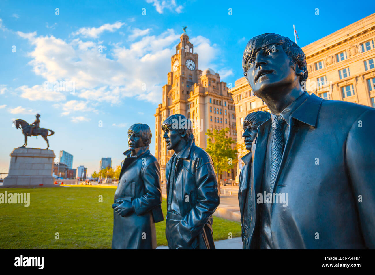 Liverpool, UK - May 17 2018: Bronze statue of the Beatles stands at the ...