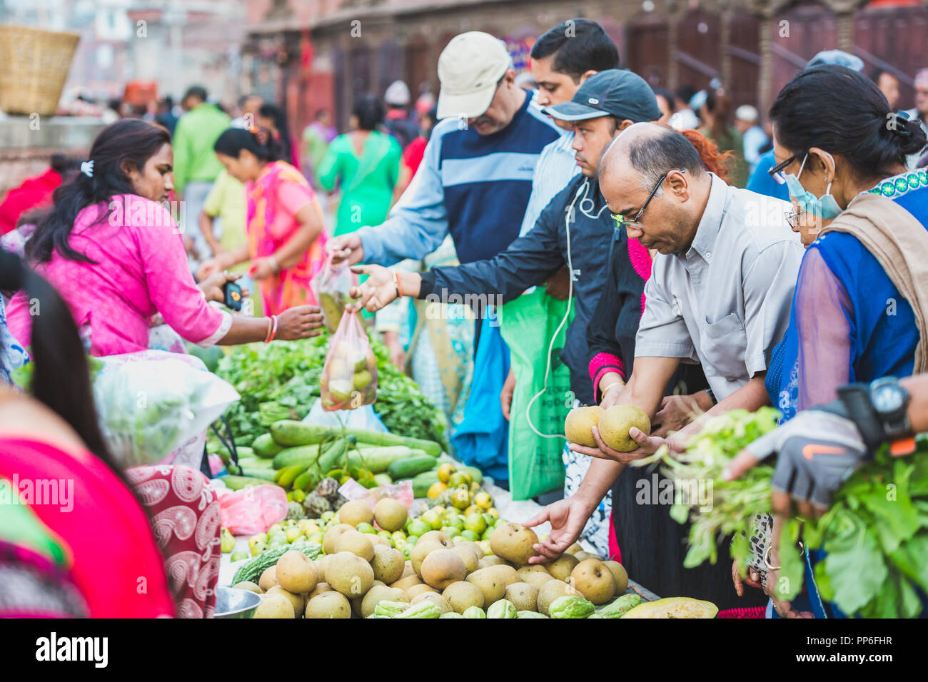 Woman Buying Vegetables In Marketplace High Resolution Stock ...