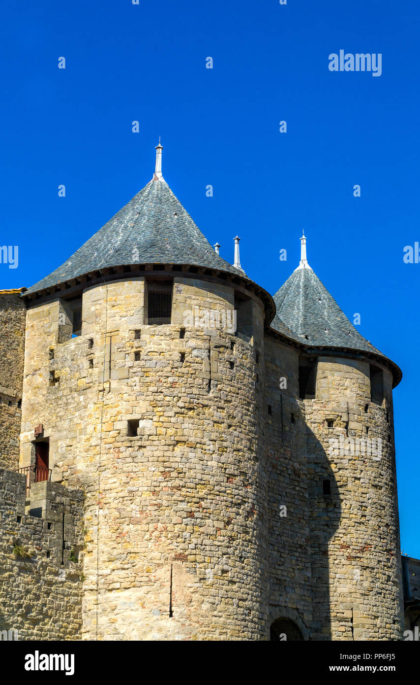 Two Large round tower with battlements and fortress wall in the ...