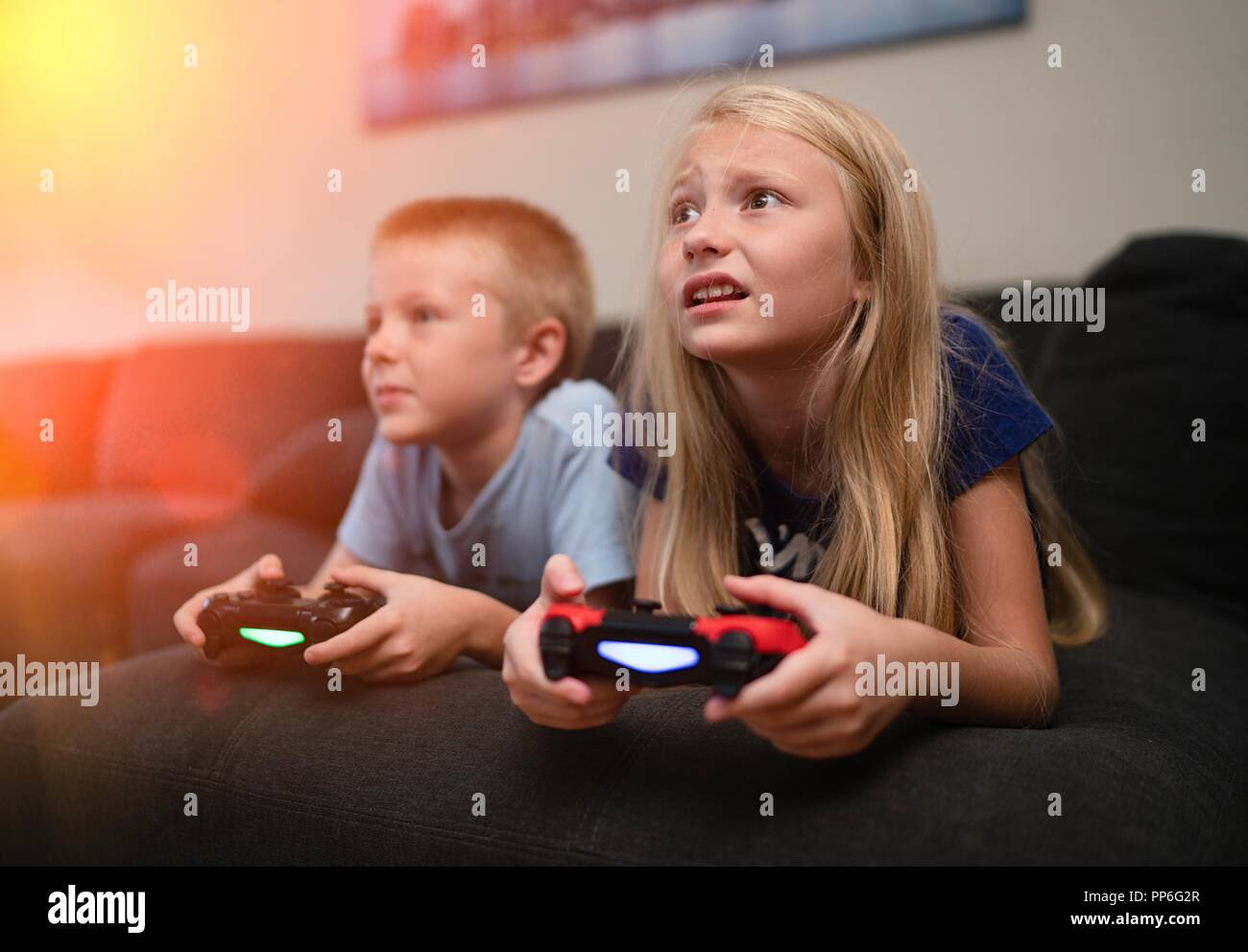 Children playing video games Stock Photo - Alamy
