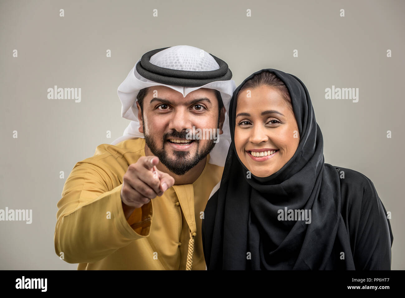 Portrait of arabic couple with traditional clothes in a studio Stock ...