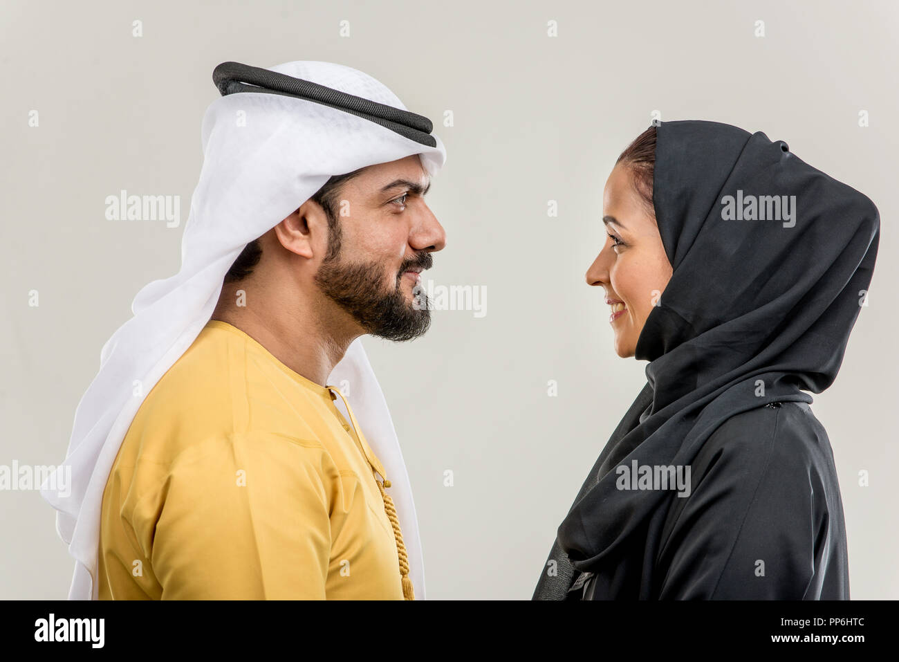 Portrait of arabic couple with traditional clothes in a studio Stock ...