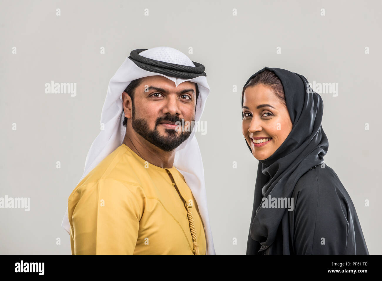 Portrait of arabic couple with traditional clothes in a studio Stock ...
