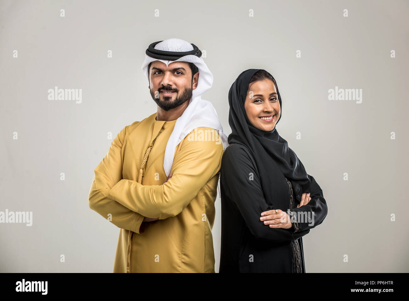 Portrait of arabic couple with traditional clothes in a studio Stock ...