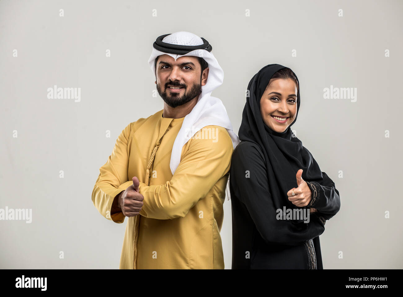 Portrait of arabic couple with traditional clothes in a studio Stock ...