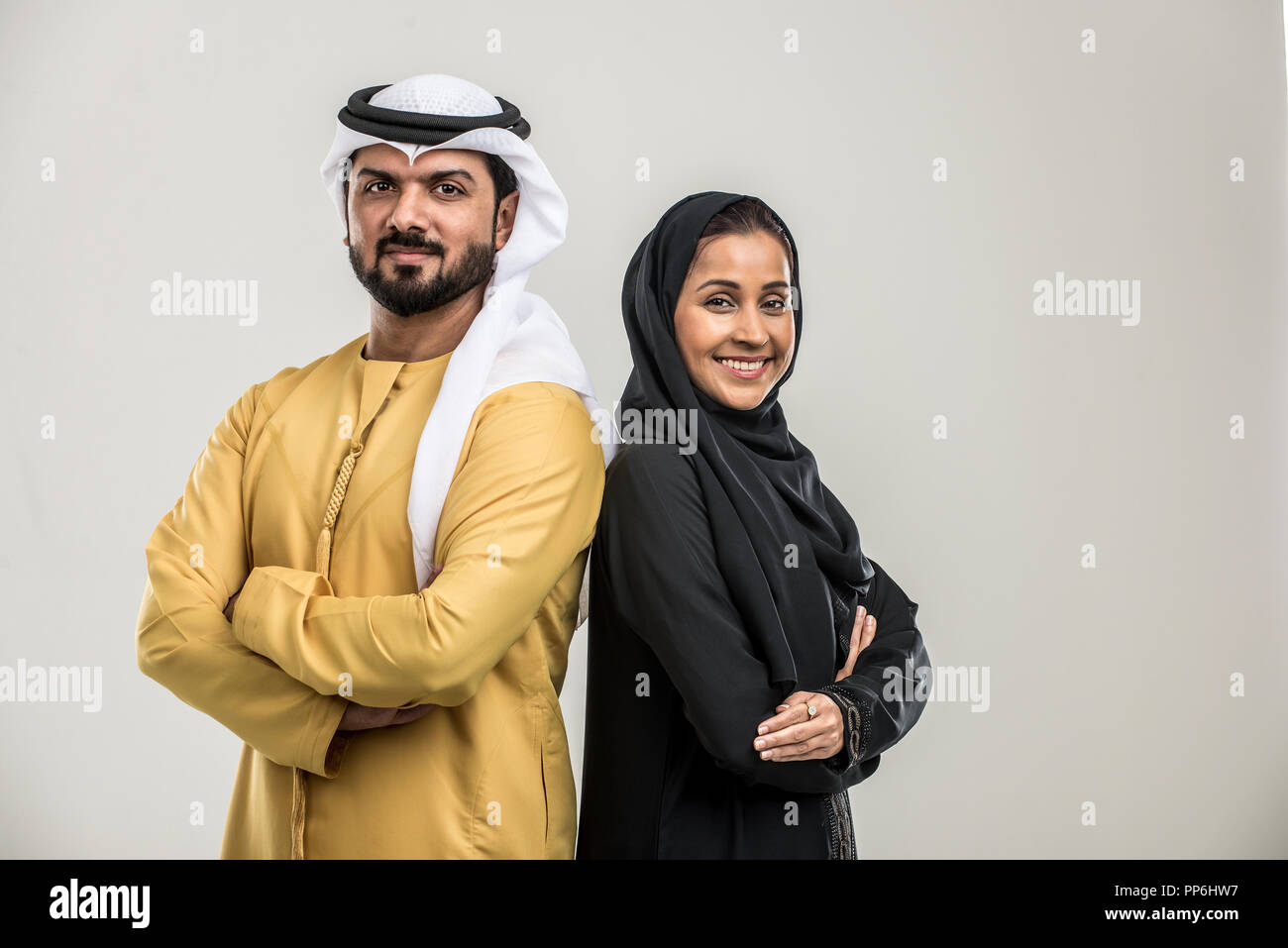 Portrait of arabic couple with traditional clothes in a studio Stock ...