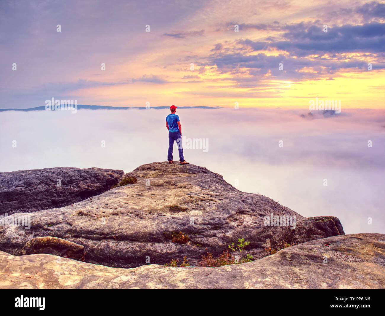 Person cliff gloomy hi-res stock photography and images - Alamy