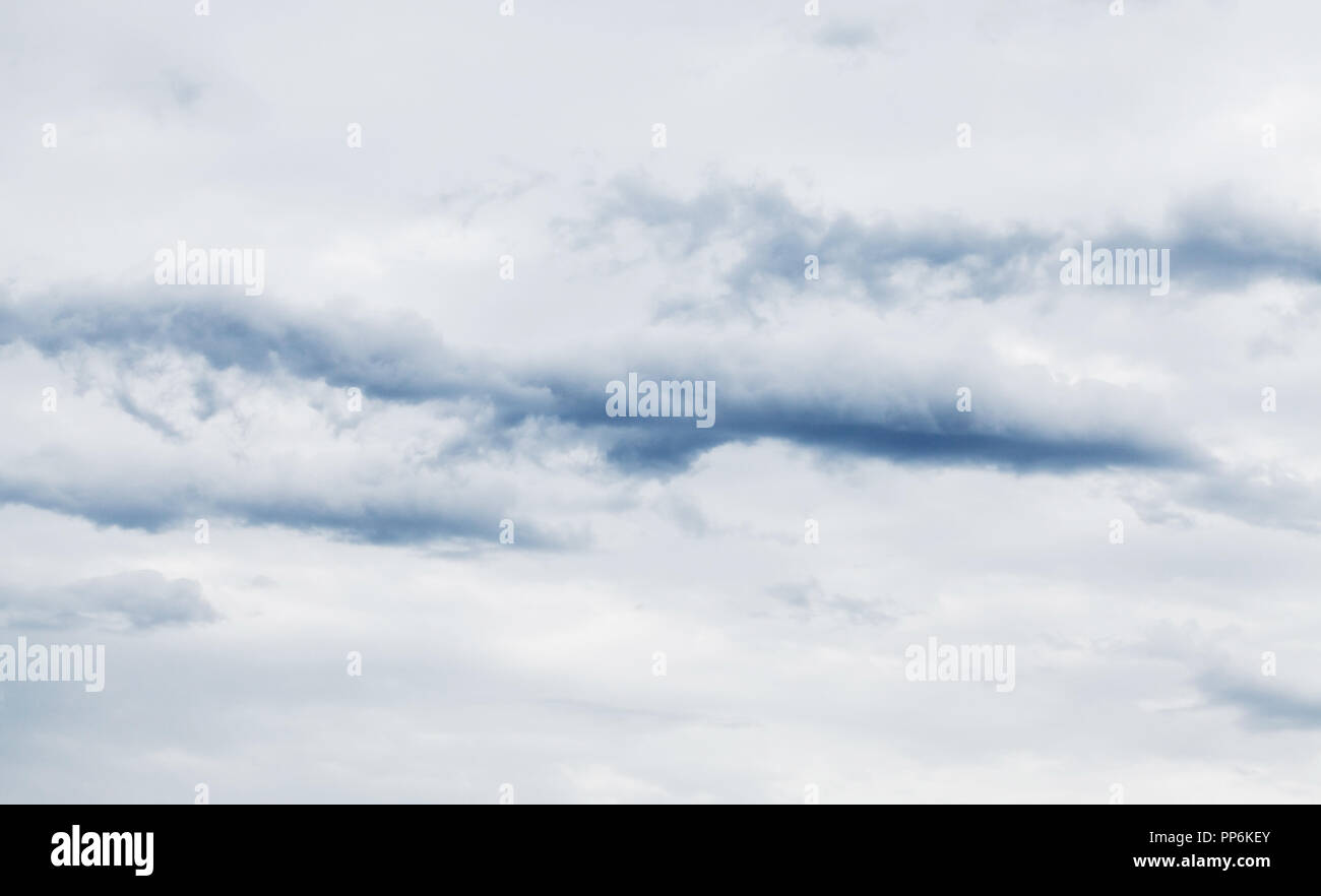 White clouds in rainy day sky, natural background photo Stock Photo - Alamy