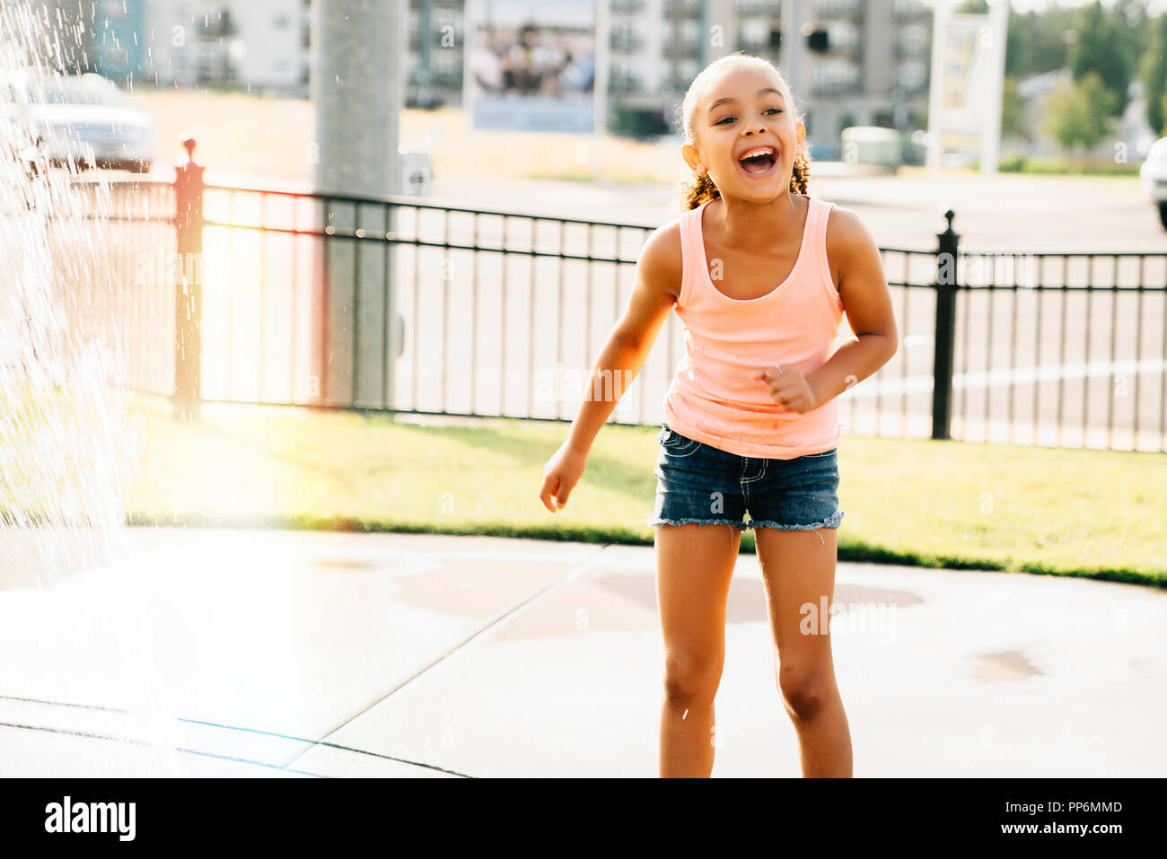 Cheerful wet teen girl hi-res stock photography and images - Alamy