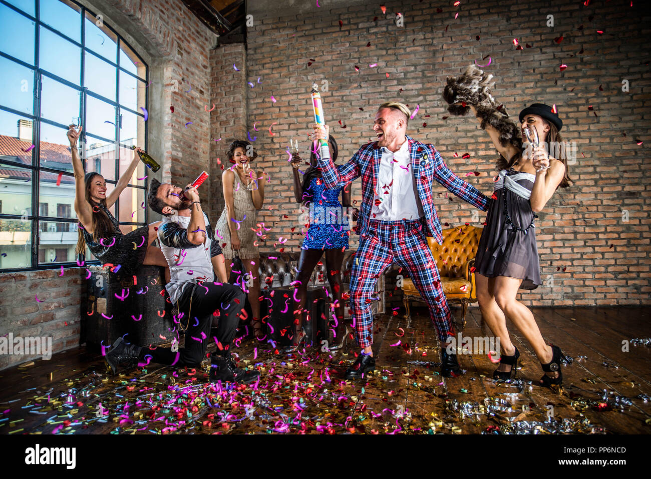 Multicultural group of friends having party - Happy people having fun ...