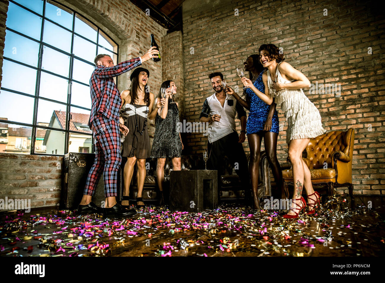 Multicultural group of friends having party - Happy people having fun ...