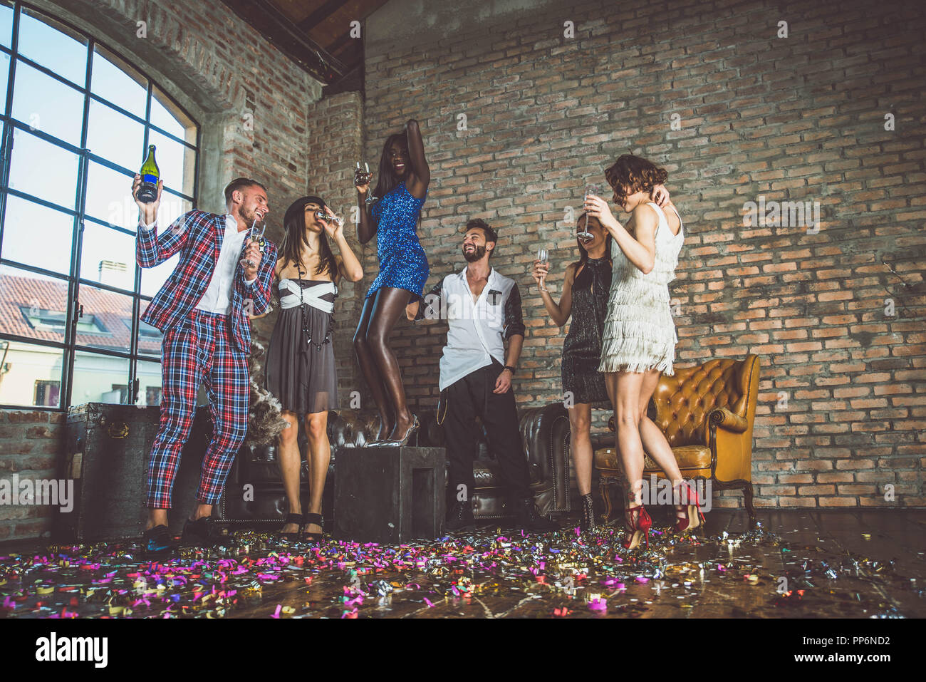 Multicultural group of friends having party - Happy people having fun ...