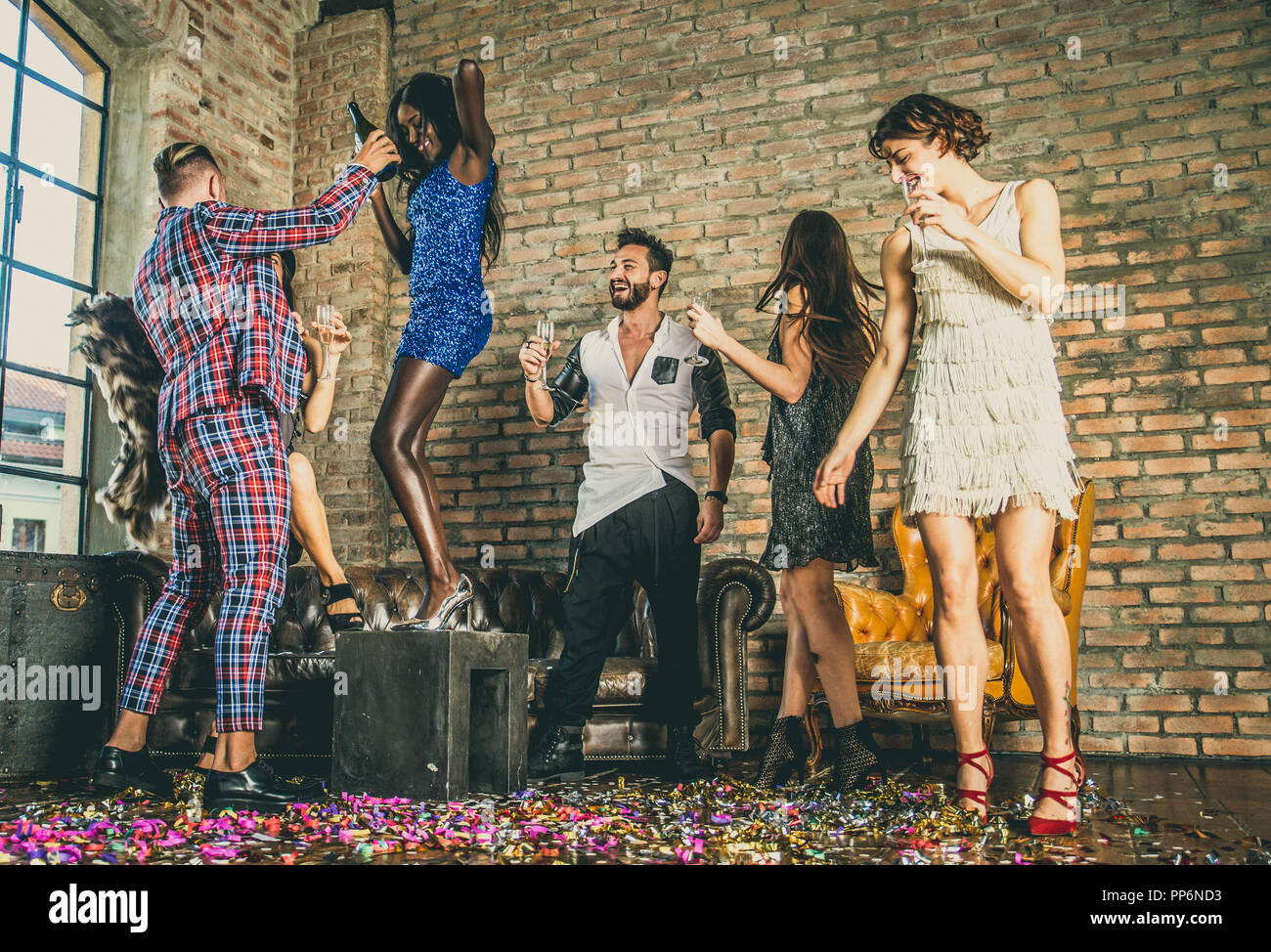 Multicultural group of friends having party - Happy people having fun ...