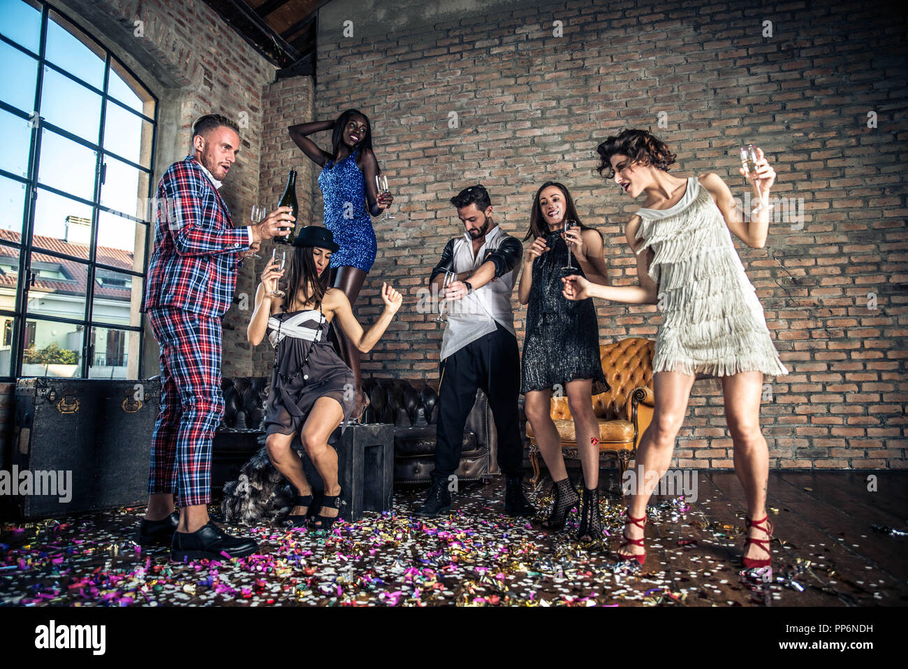 Multicultural group of friends having party - Happy people having fun ...